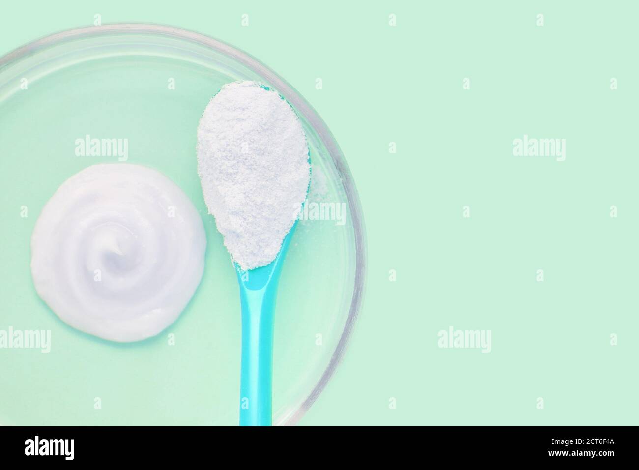 Collagen white powder. Pastel color background. Health product Stock ...