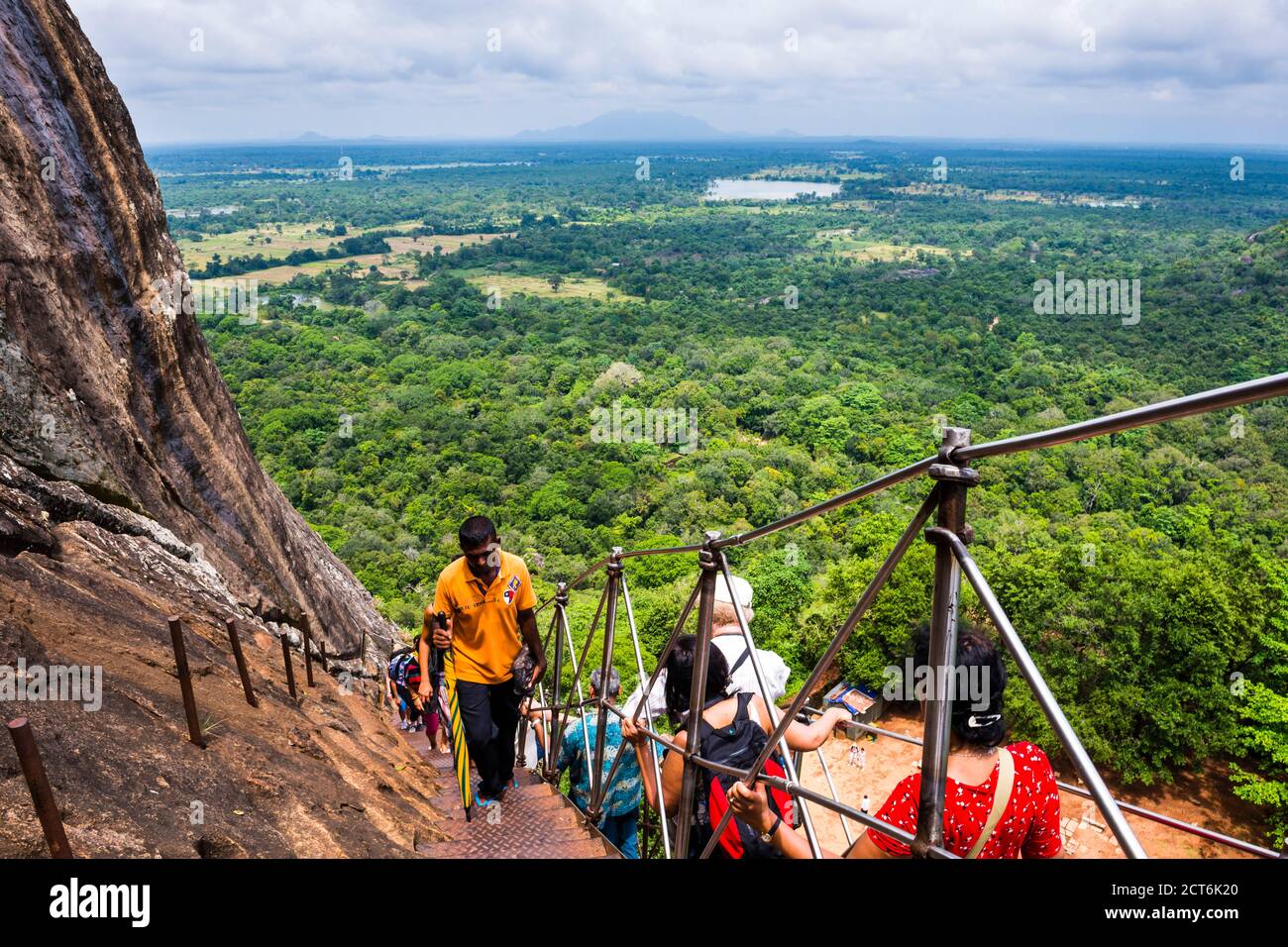 Tourists climbing Sigiriya Rock Fortress, aka Lion Rock, Sri Lanka ...
