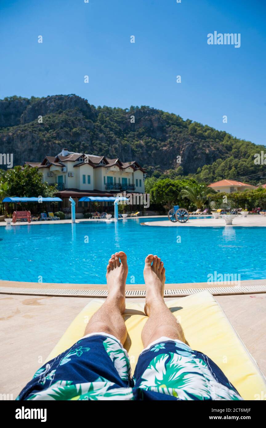Sunbathing at a swimming pool at a resort in Dalyan, Mugla Province ...