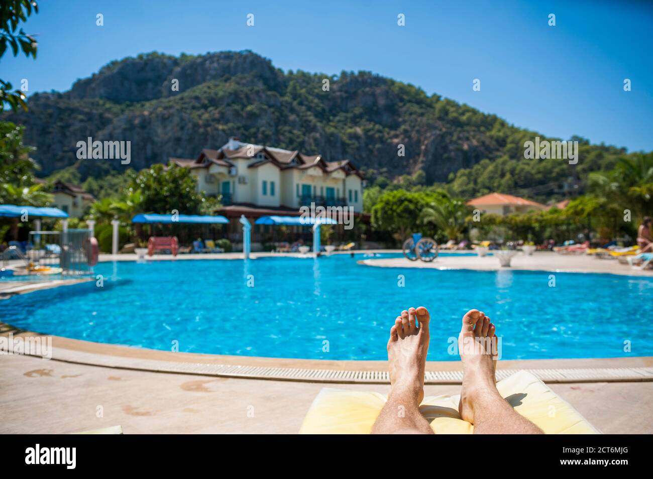 Sunbathing at a swimming pool at a resort in Dalyan, Mugla Province ...