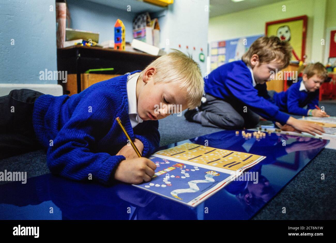 Children in the classroom at Wool First School in Dorset doing ...