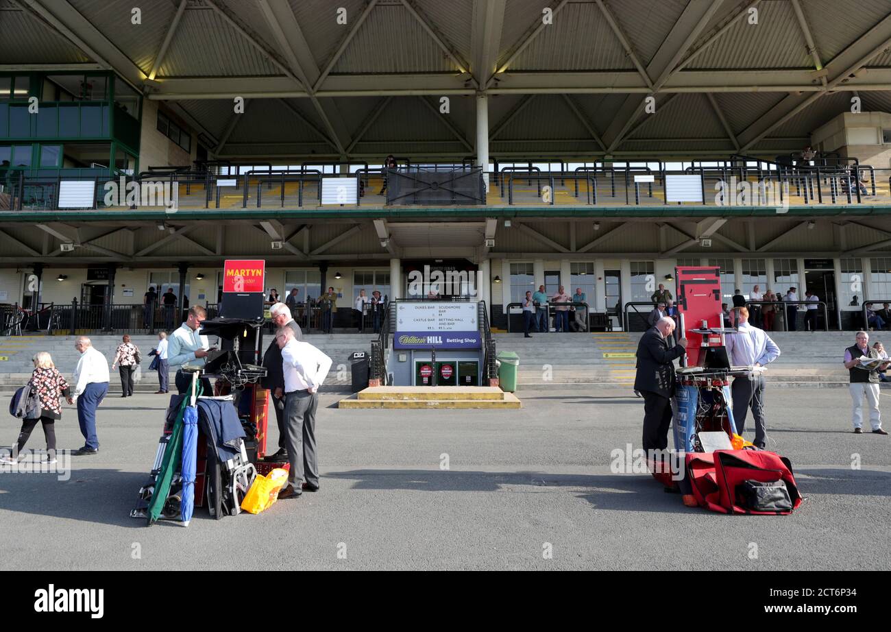Bookmakers with their stands at Warwick Racecourse Stock Photo - Alamy