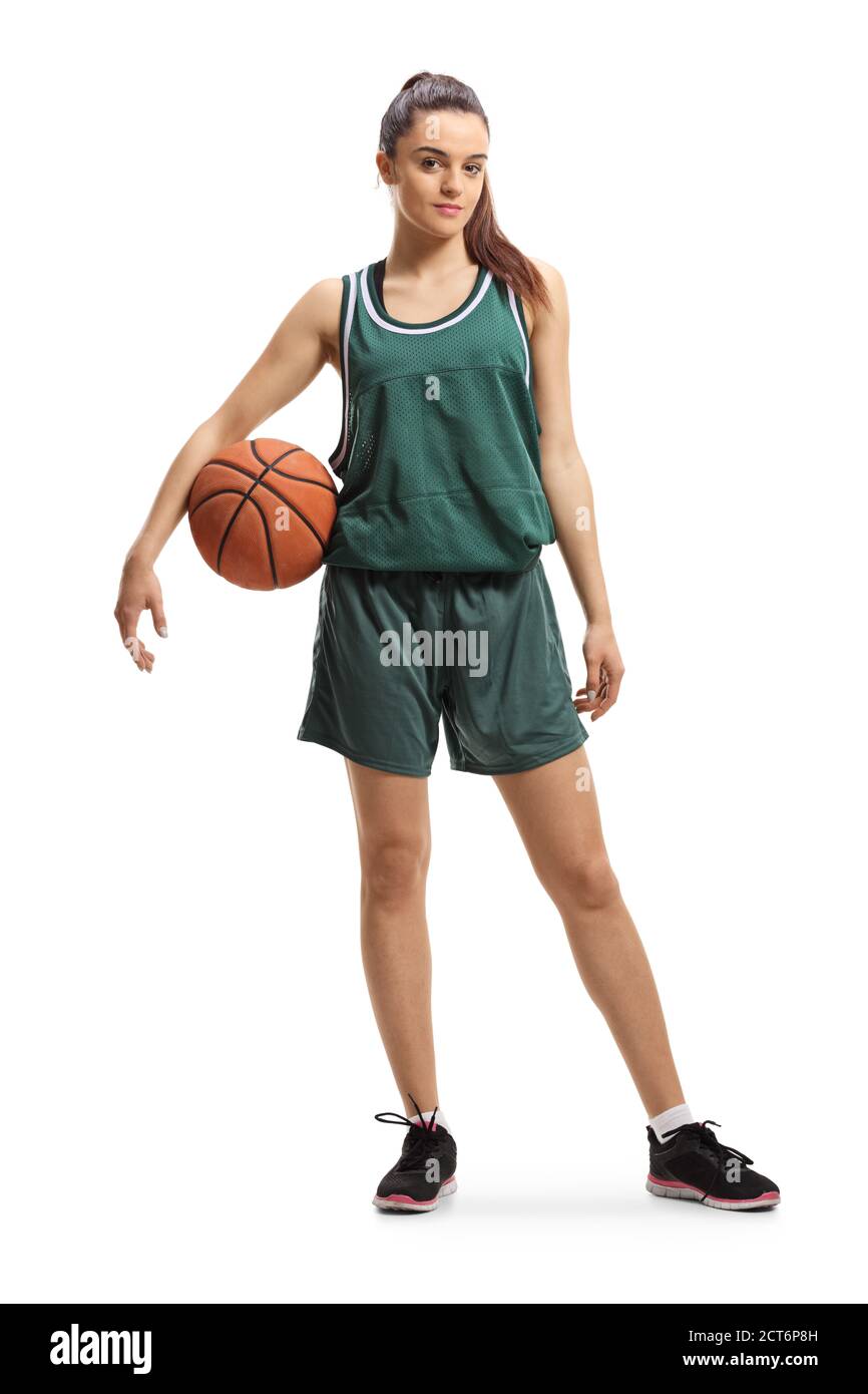 Full length portrait of a emale basketball player posing with a ball ...