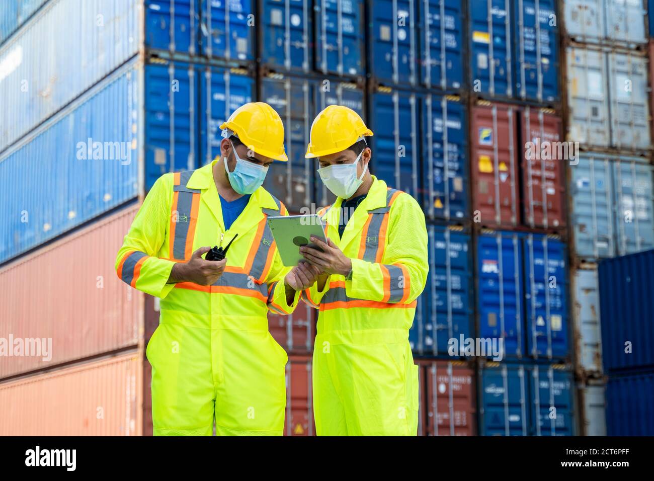 Container worker wearing protective mask to Protect Against Covid-19 ...