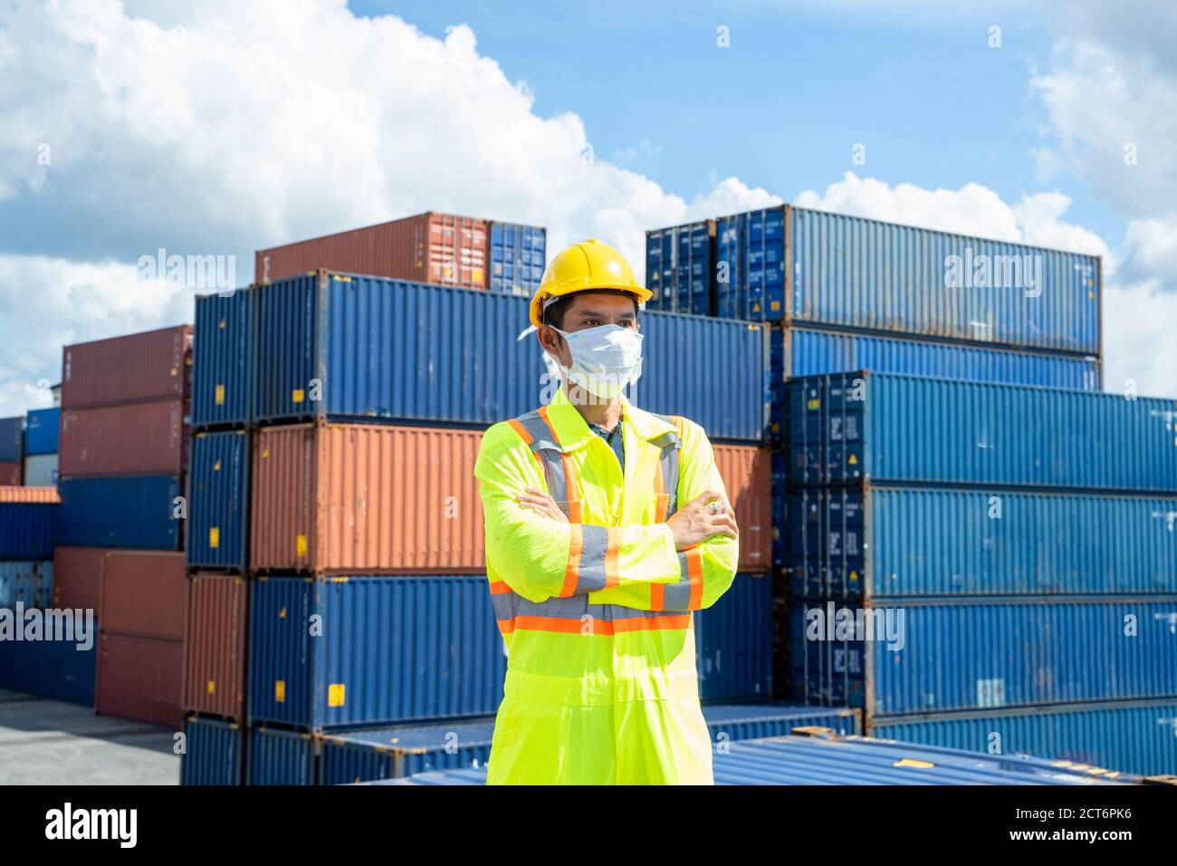Container worker wearing protection face mask during corona virus and ...