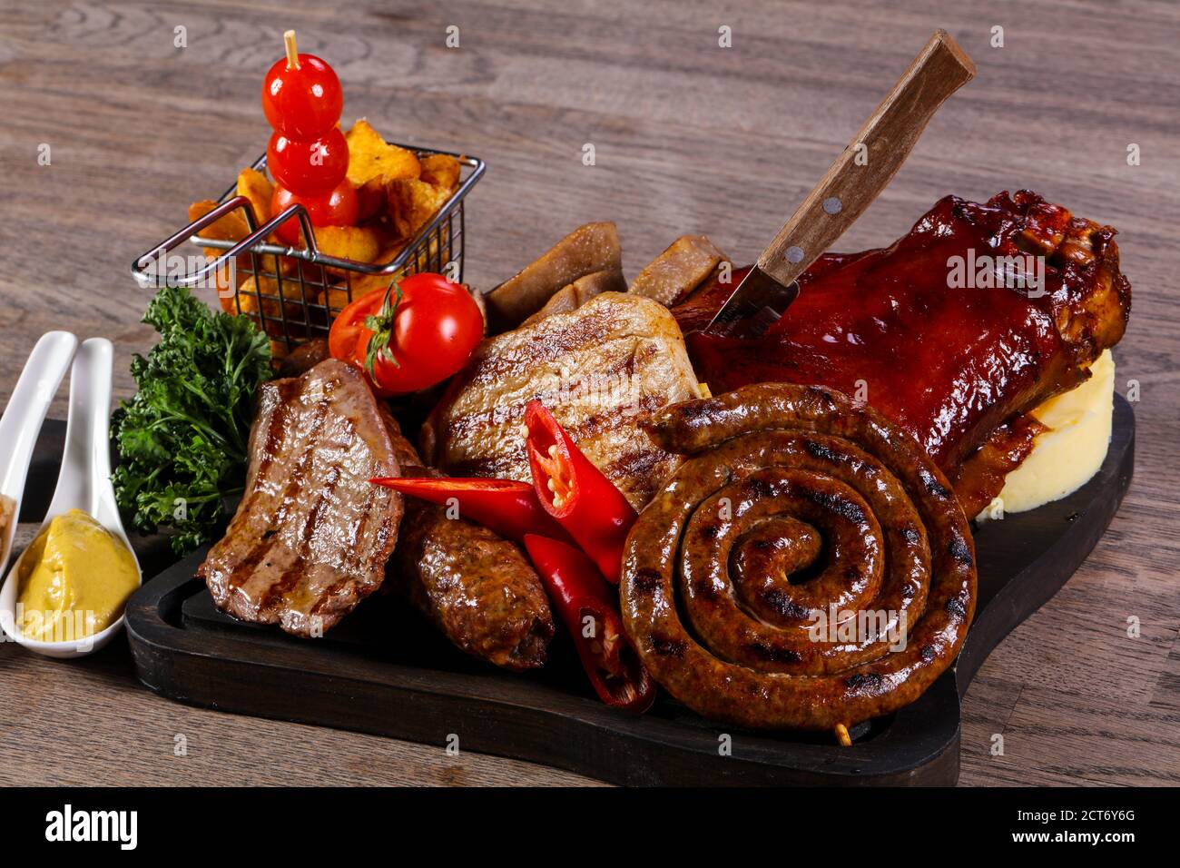 Grilled meat mix plate - beef, pork and chicken Stock Photo - Alamy
