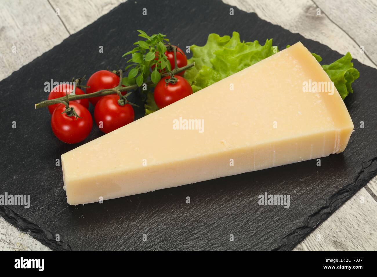 Italian traditional parmesan cheese triangle served salad Stock Photo ...