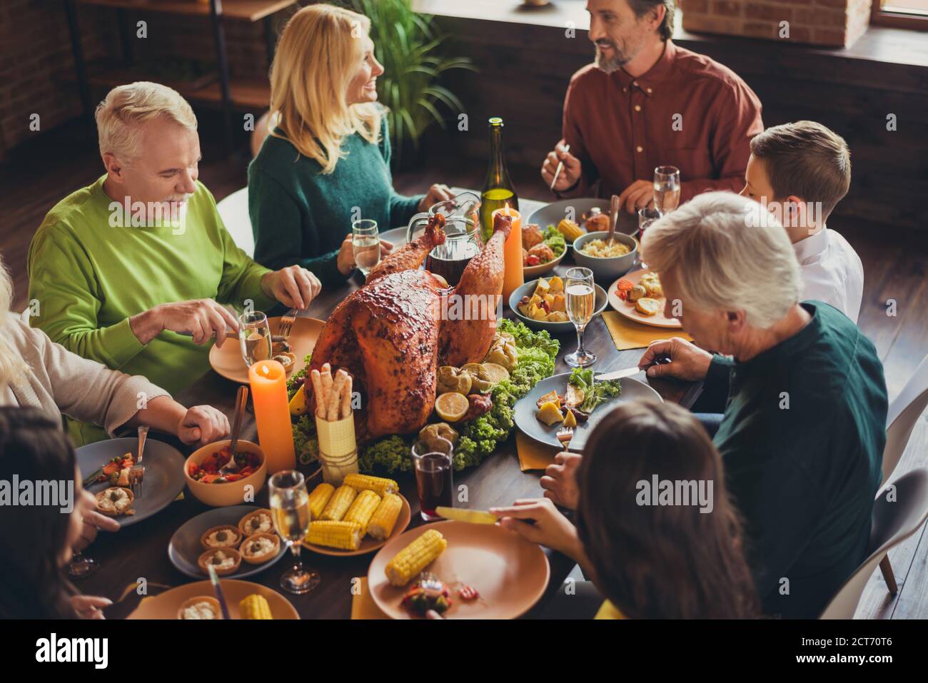 Holiday feast table family relatives gathering thanks giving dinner ...