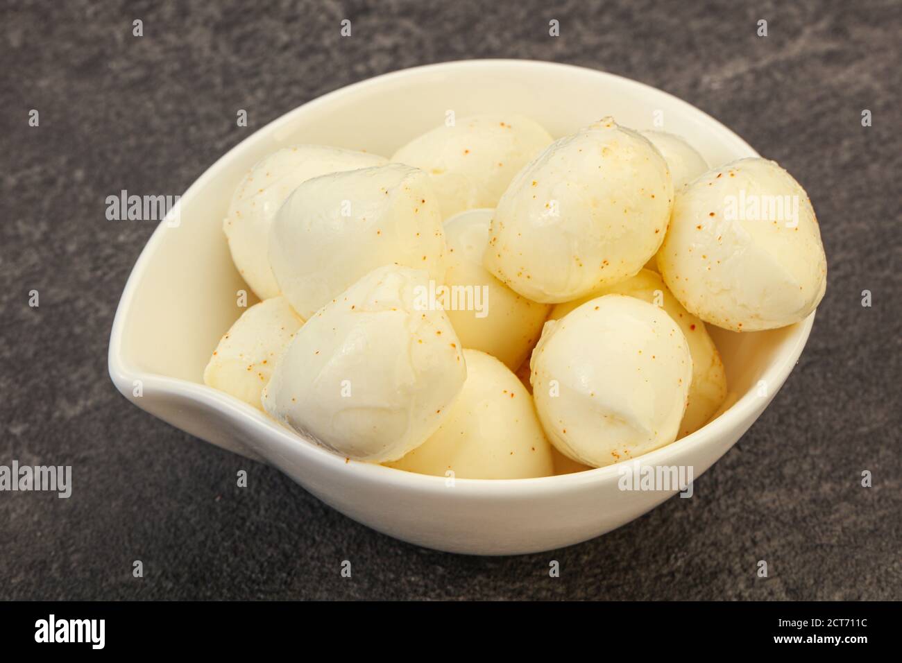Natural tasty baby Mozarella cheese in the bowl Stock Photo - Alamy