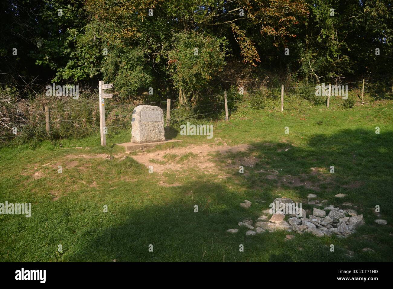 Market stone on the Thames Path at Thames Head marking the source of ...