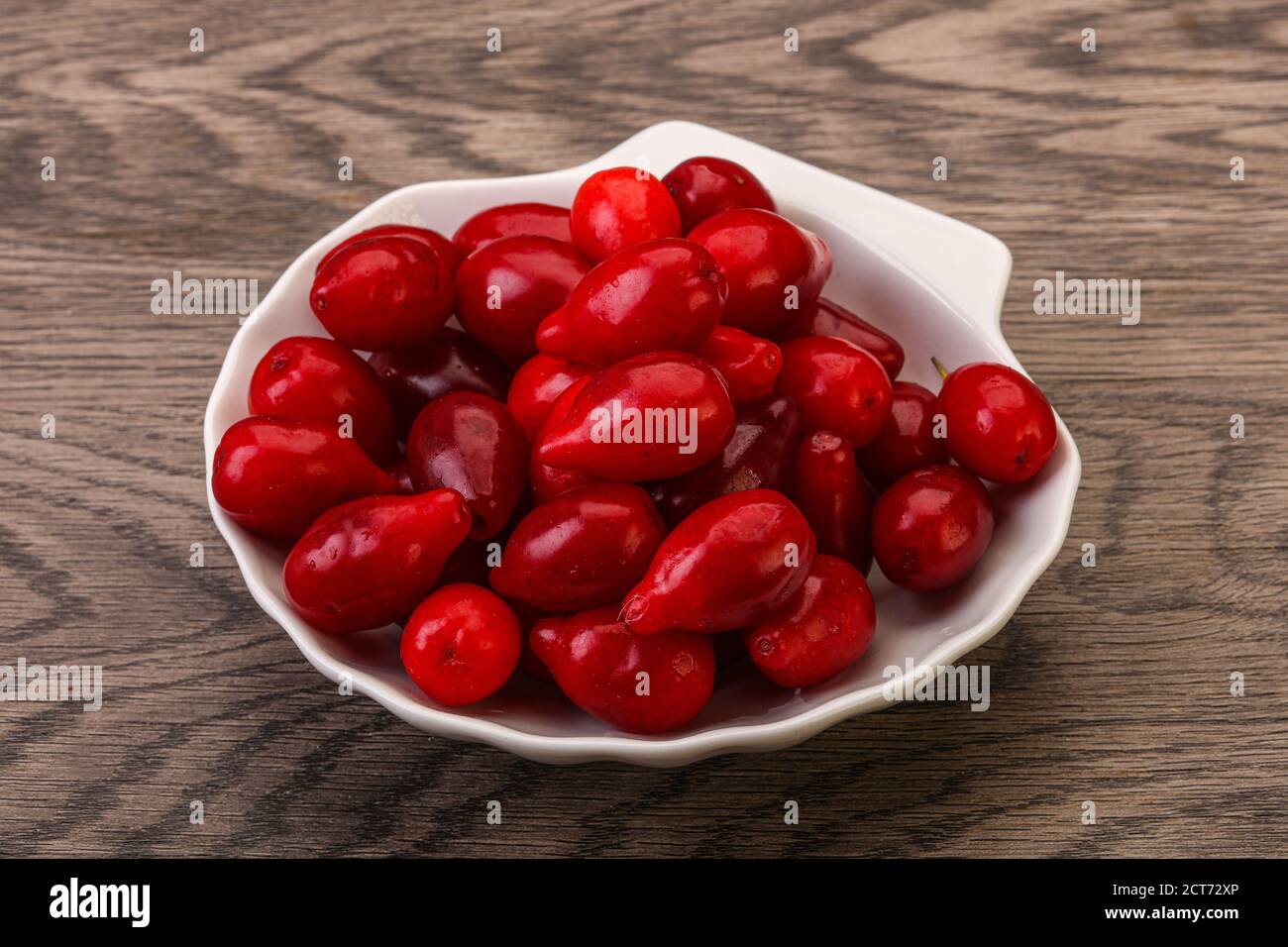 Sweet and ripe cornel or dogtree berries Stock Photo - Alamy