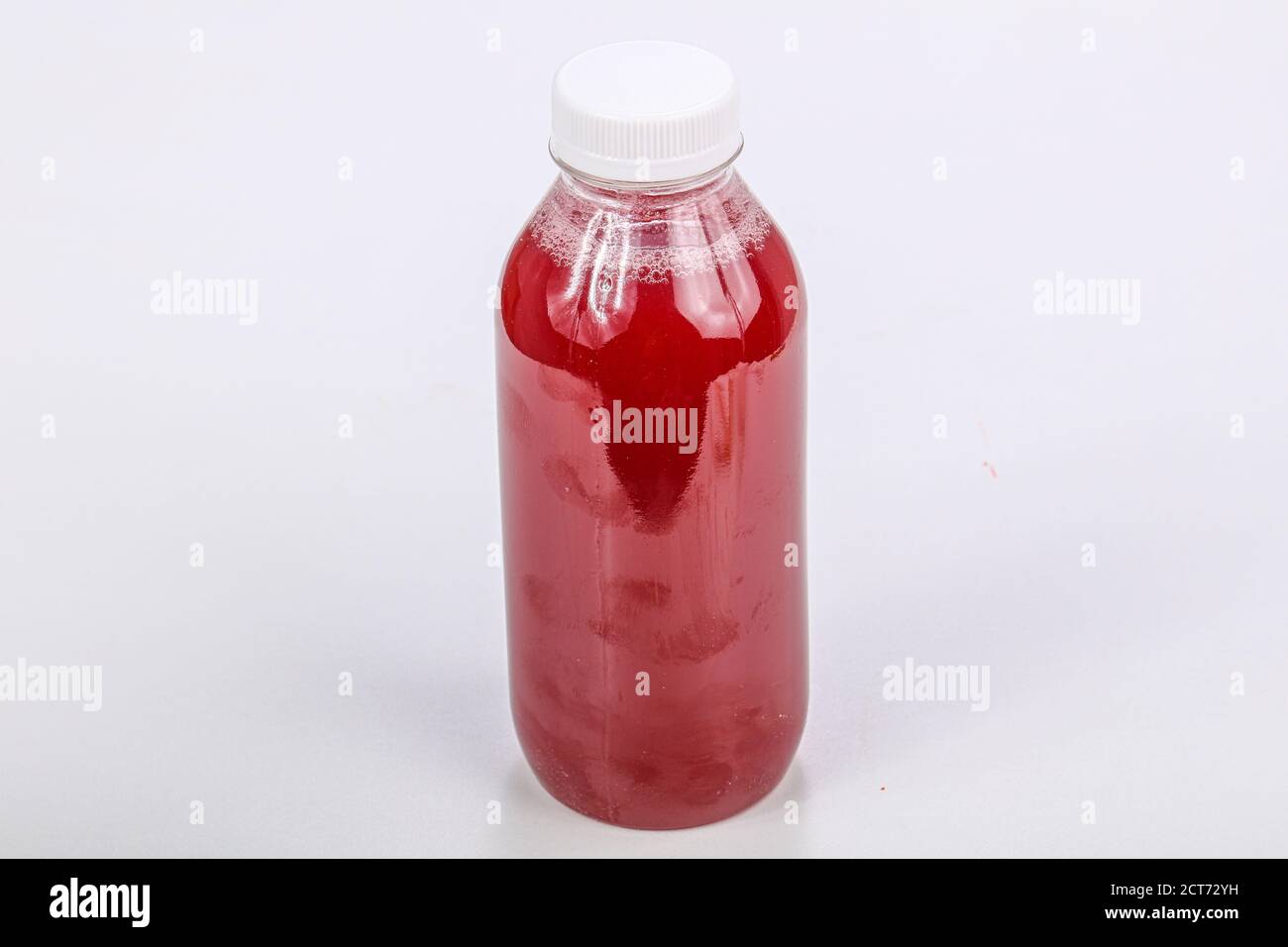 Fresh Cherry juice in the bottle Stock Photo - Alamy
