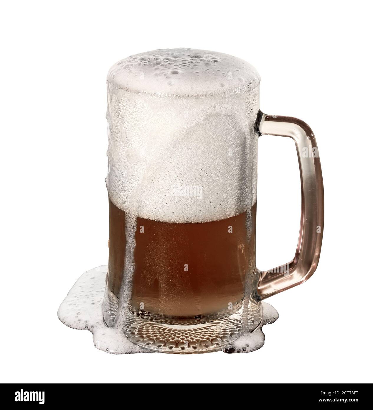 A glass with beer and a large layer of foam that partially flows over ...