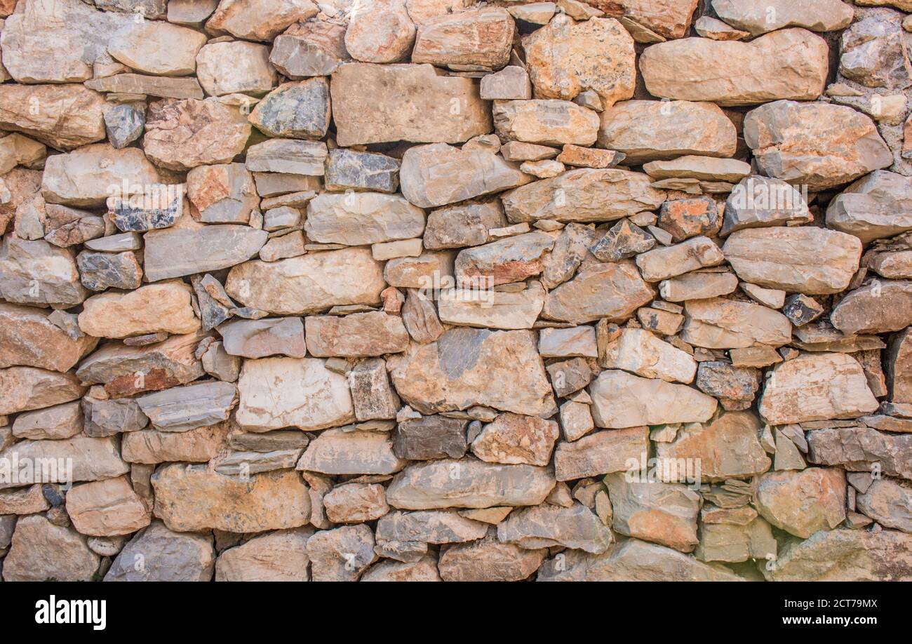 Background of stone wall texture photo. Greek ancient wall texture ...