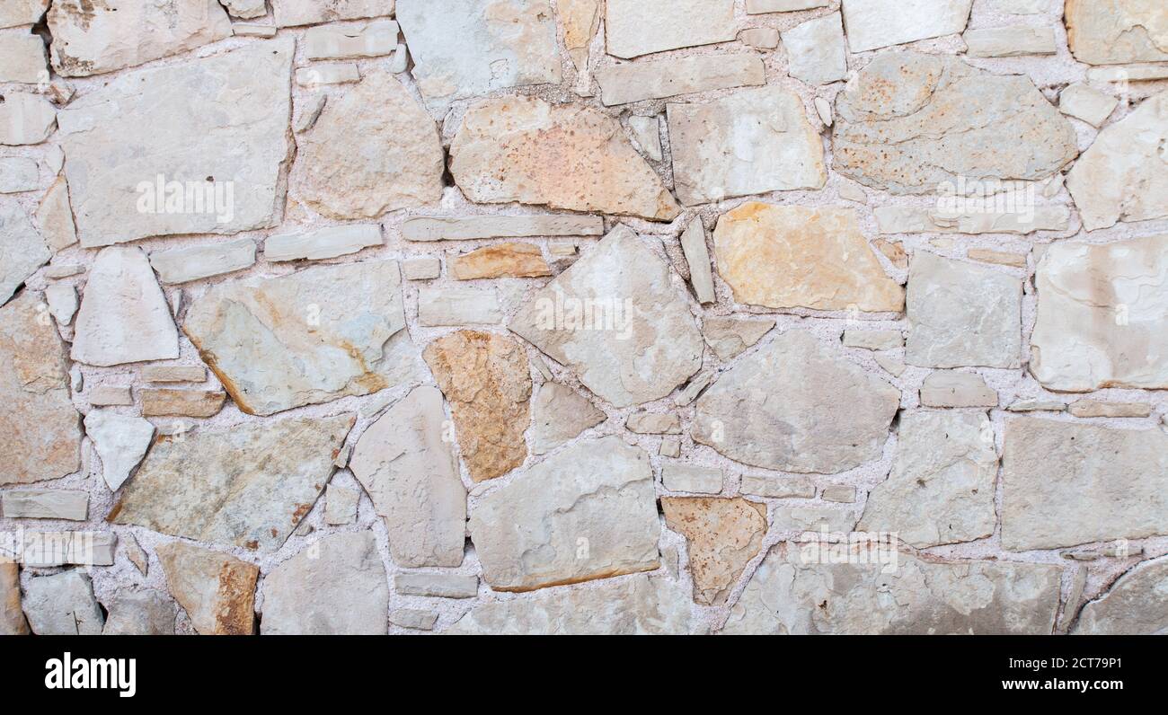 Texture of a stone wall. Old stone wall texture background. Stone wall ...