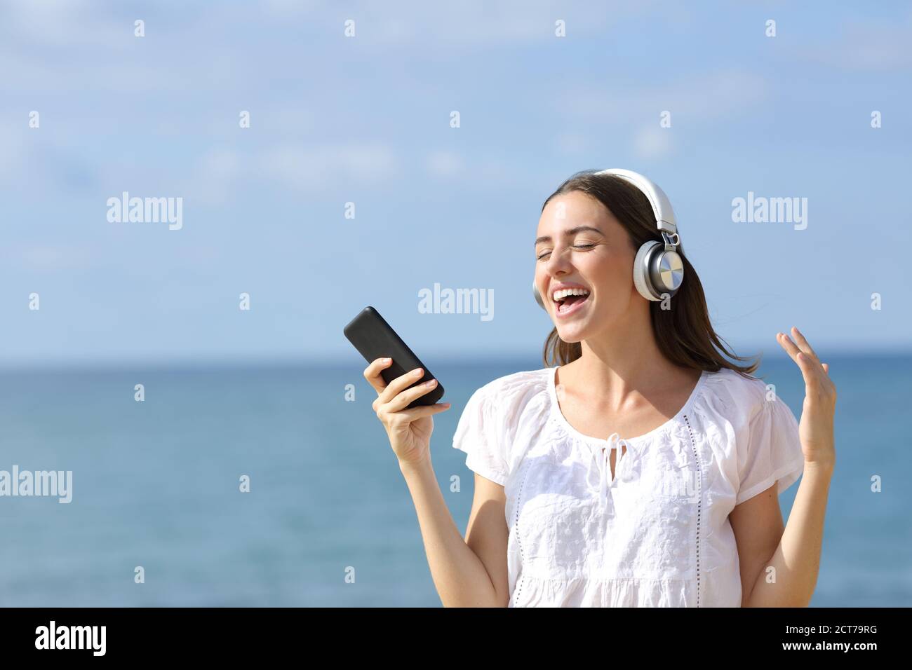 Female Singing Beach High Resolution Stock Photography and Images - Alamy