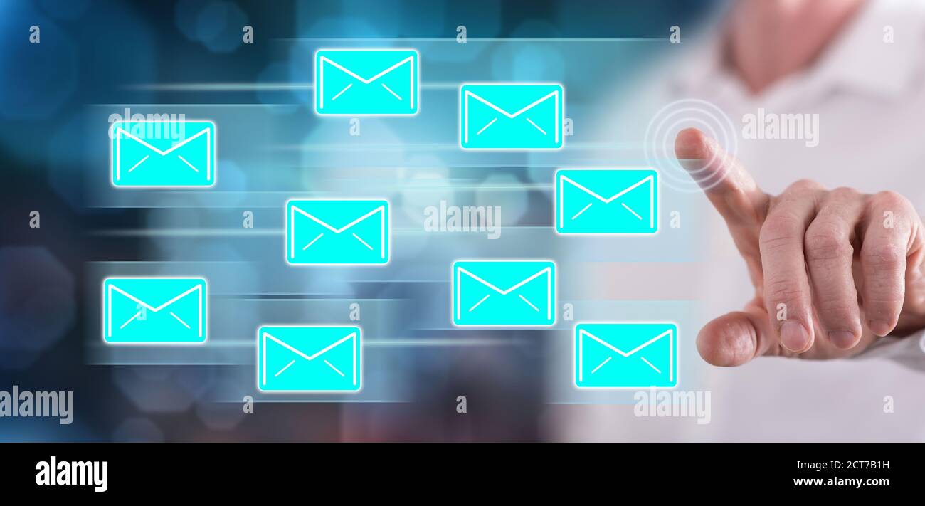 Man touching an email sending concept on a touch screen with his finger ...