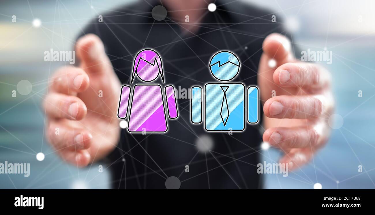 Gender equality concept between hands of a man in background Stock ...