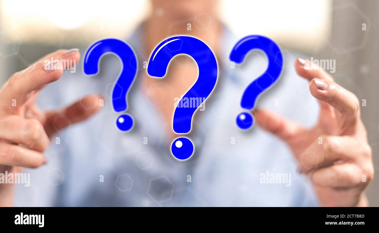 Question concept between hands hi-res stock photography and images - Alamy