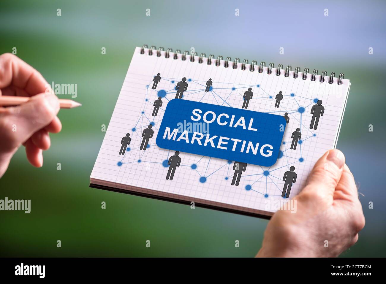 Hand drawing social marketing concept on a notepad Stock Photo - Alamy