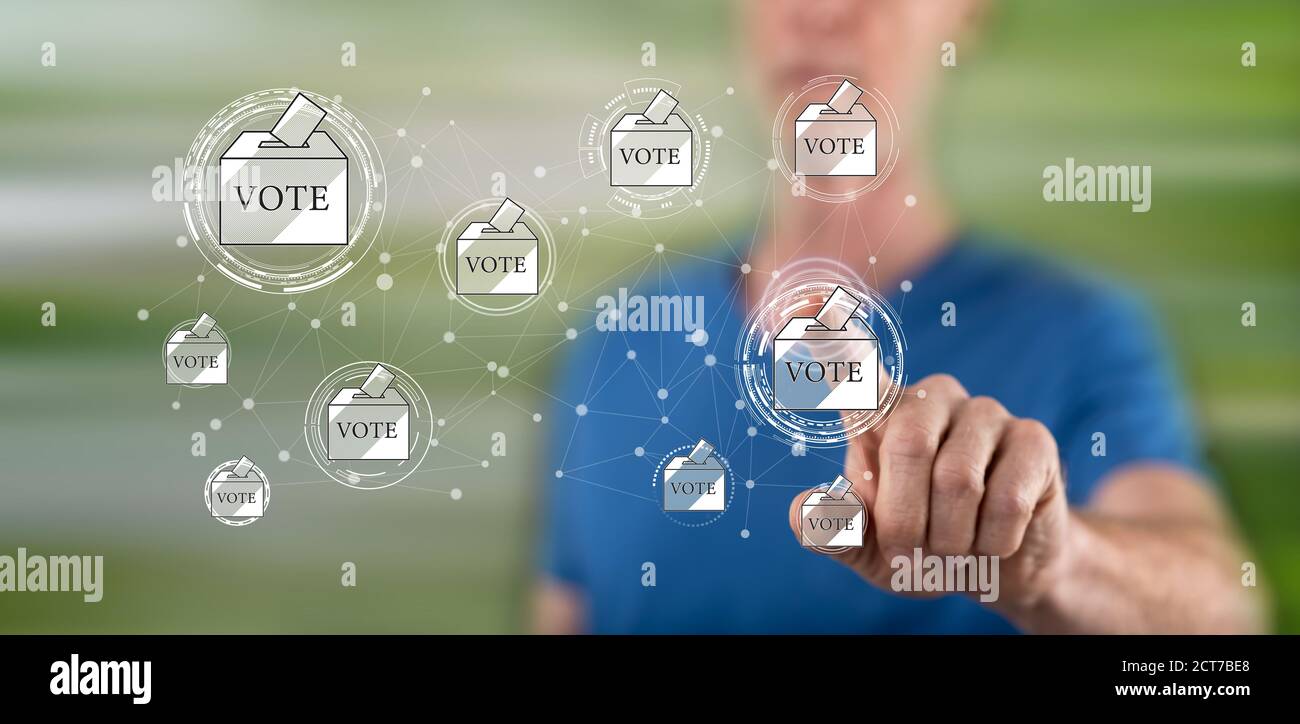 Man touching an online voting concept on a touch screen with his finger ...