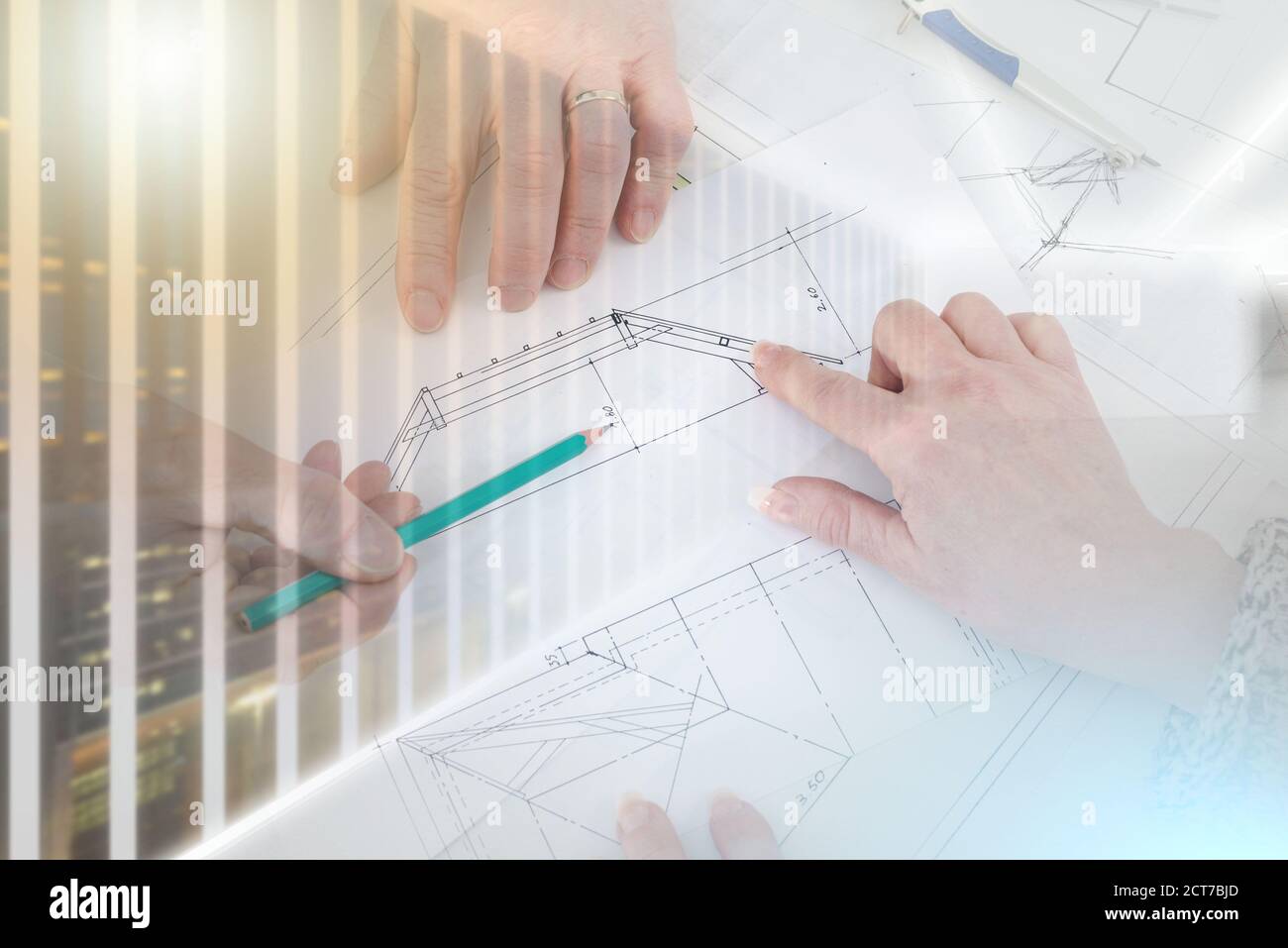 Architect showing house plans to his client; multiple exposure Stock ...