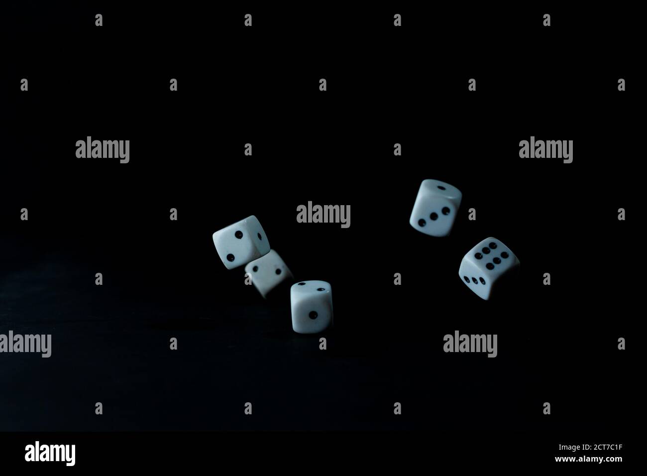 Woman rolling dice hi-res stock photography and images - Alamy