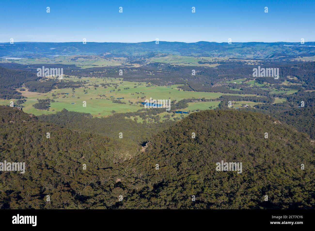 Aerial view of a large green valley at Mount Victoria in The Blue ...