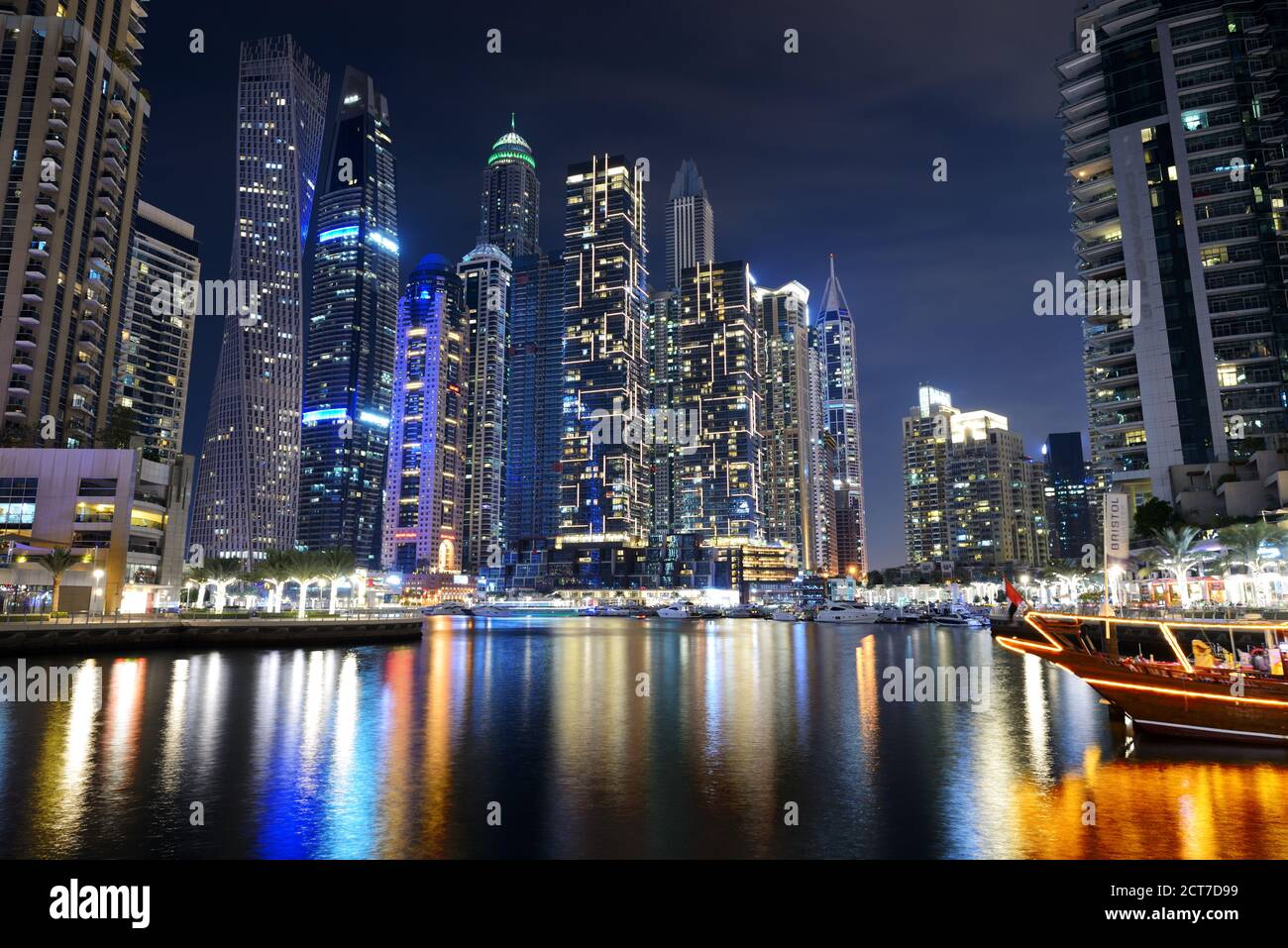 DUBAI, UAE - NOVEMBER 15: The night illumination of Dubai Marina and ... DUBAI, UAE - NOVEMBER 15: The night illumination of Dubai Marina and ...