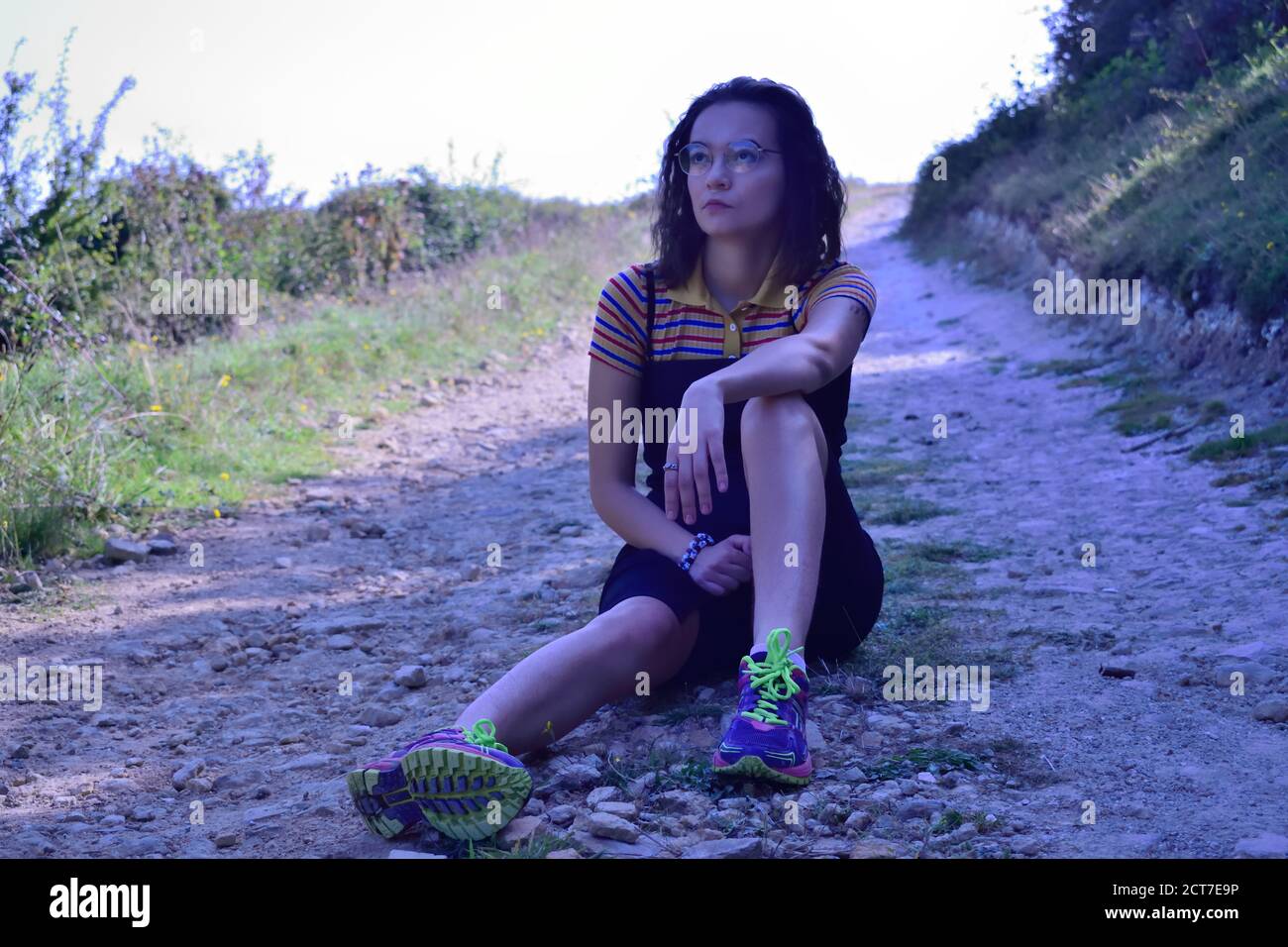 Person sitting down hi-res stock photography and images - Alamy