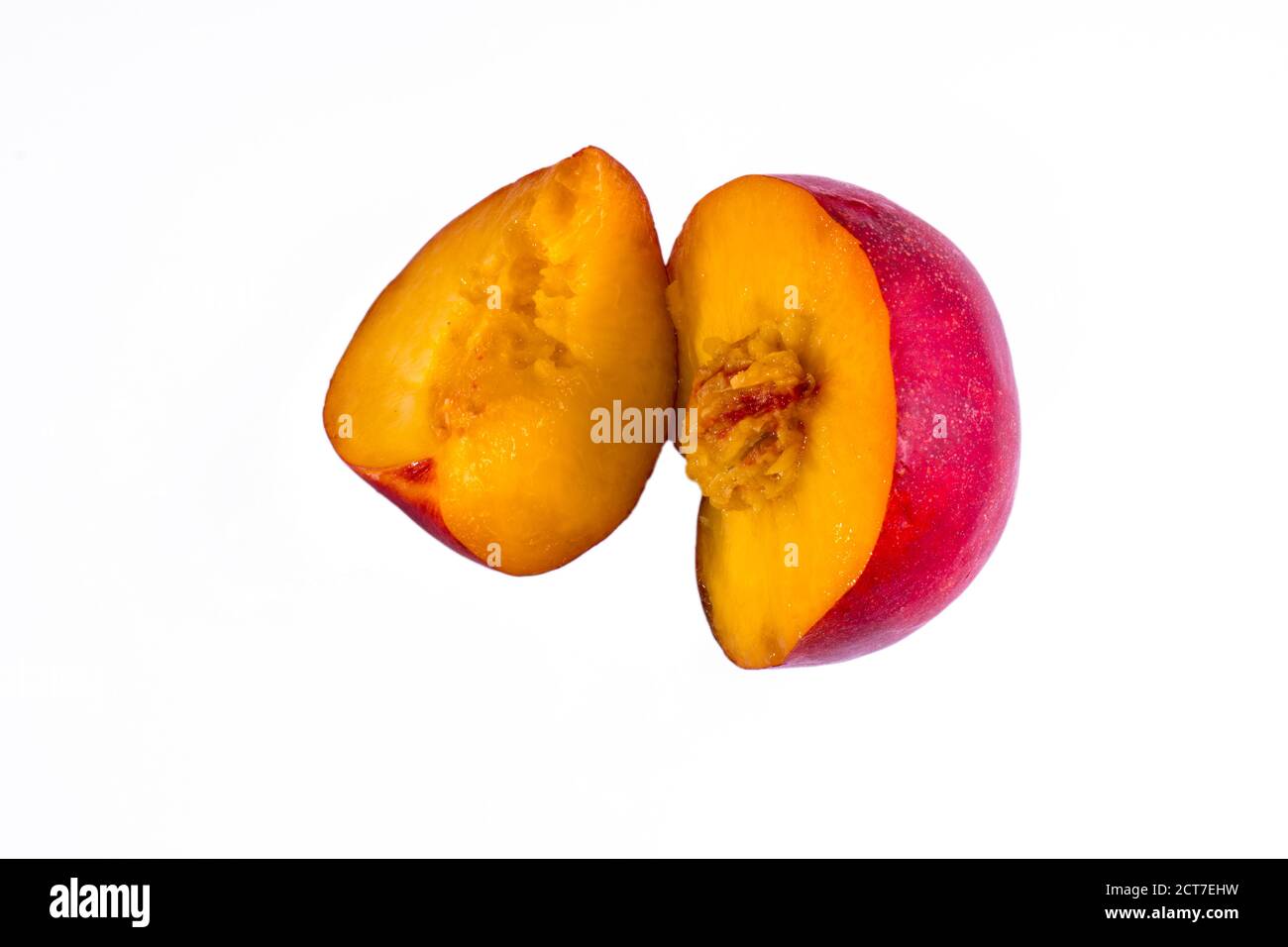 half and quarter peach on a white background Stock Photo - Alamy