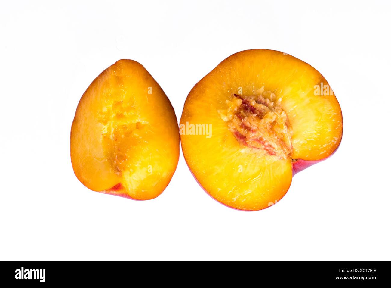 half and quarter peach on a white background Stock Photo - Alamy