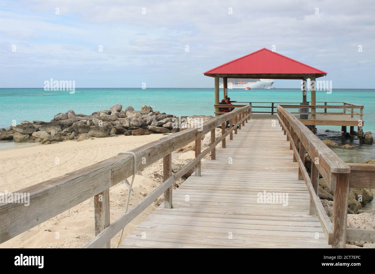 Dock leading to the ocean on a beautiful Caribbean island Stock Photo ...