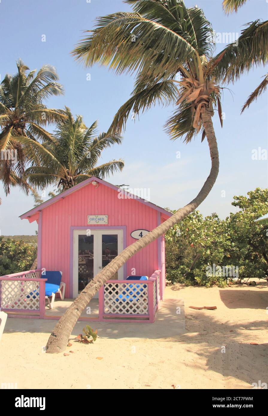 Colorful cabanas and lounge chairs along the beach at Princess Cays in ...