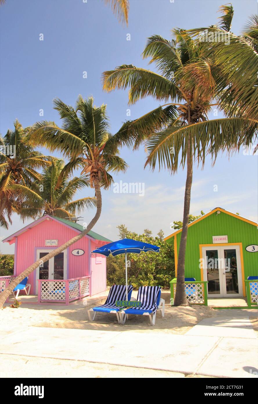 Colorful cabanas and lounge chairs along the beach at Princess Cays in ...