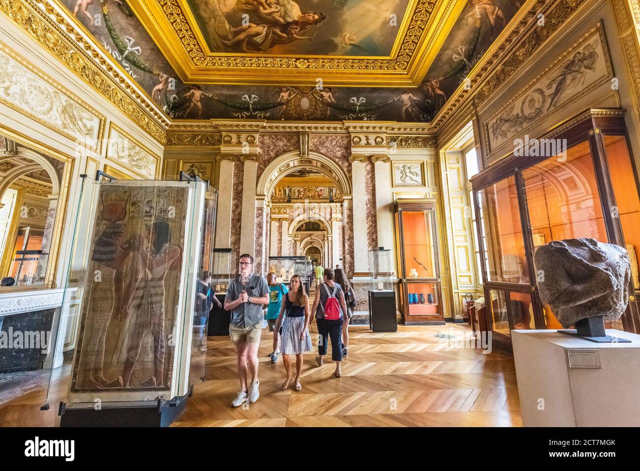 Interior of the Louvre museum in Paris. Statues and paintings. Paris ...