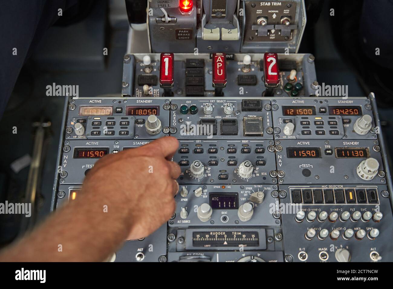 Hand of the professional pilot using control panel Stock Photo - Alamy