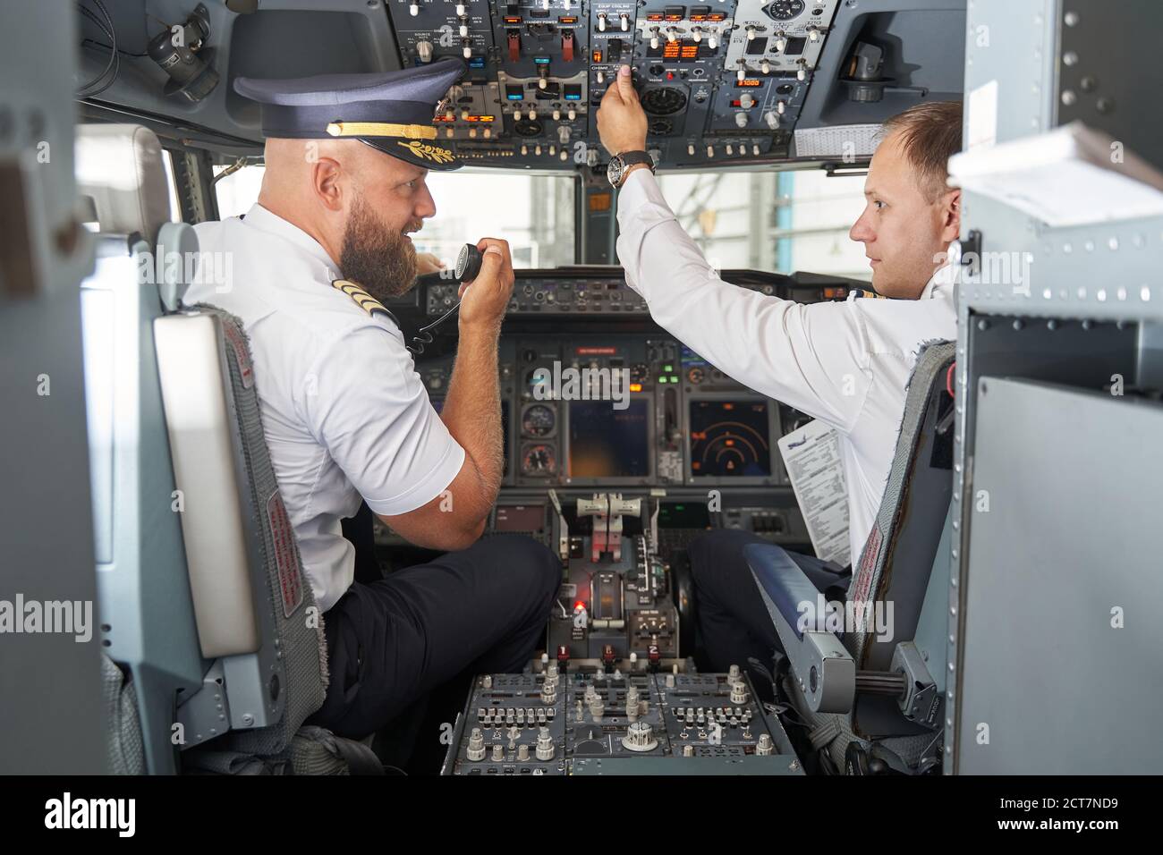 Modern cockpit of the passenger aircraft in the hangar Stock Photo - Alamy