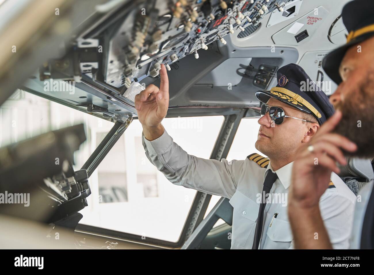 Flight deck uniform hi-res stock photography and images - Alamy