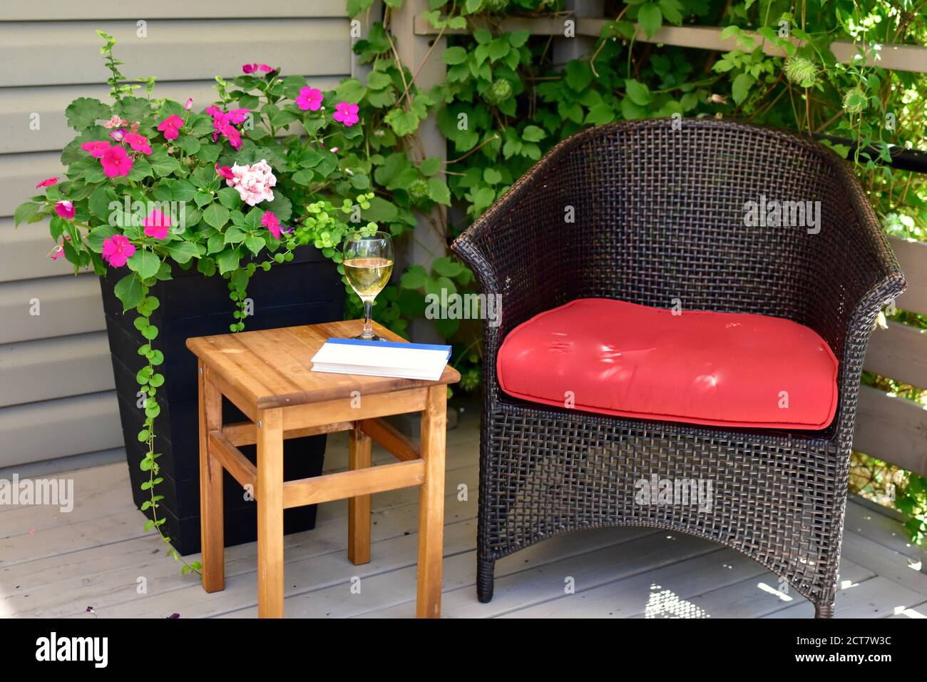 Outdoor backyard setting for home office workday in lush landscaped ...