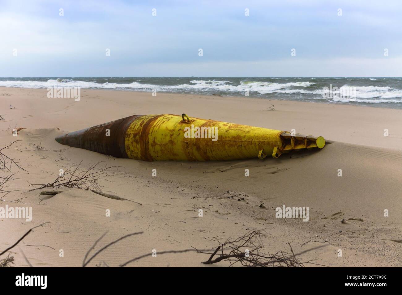 old iron float on the shore, sea buoy made of iron Stock Photo - Alamy