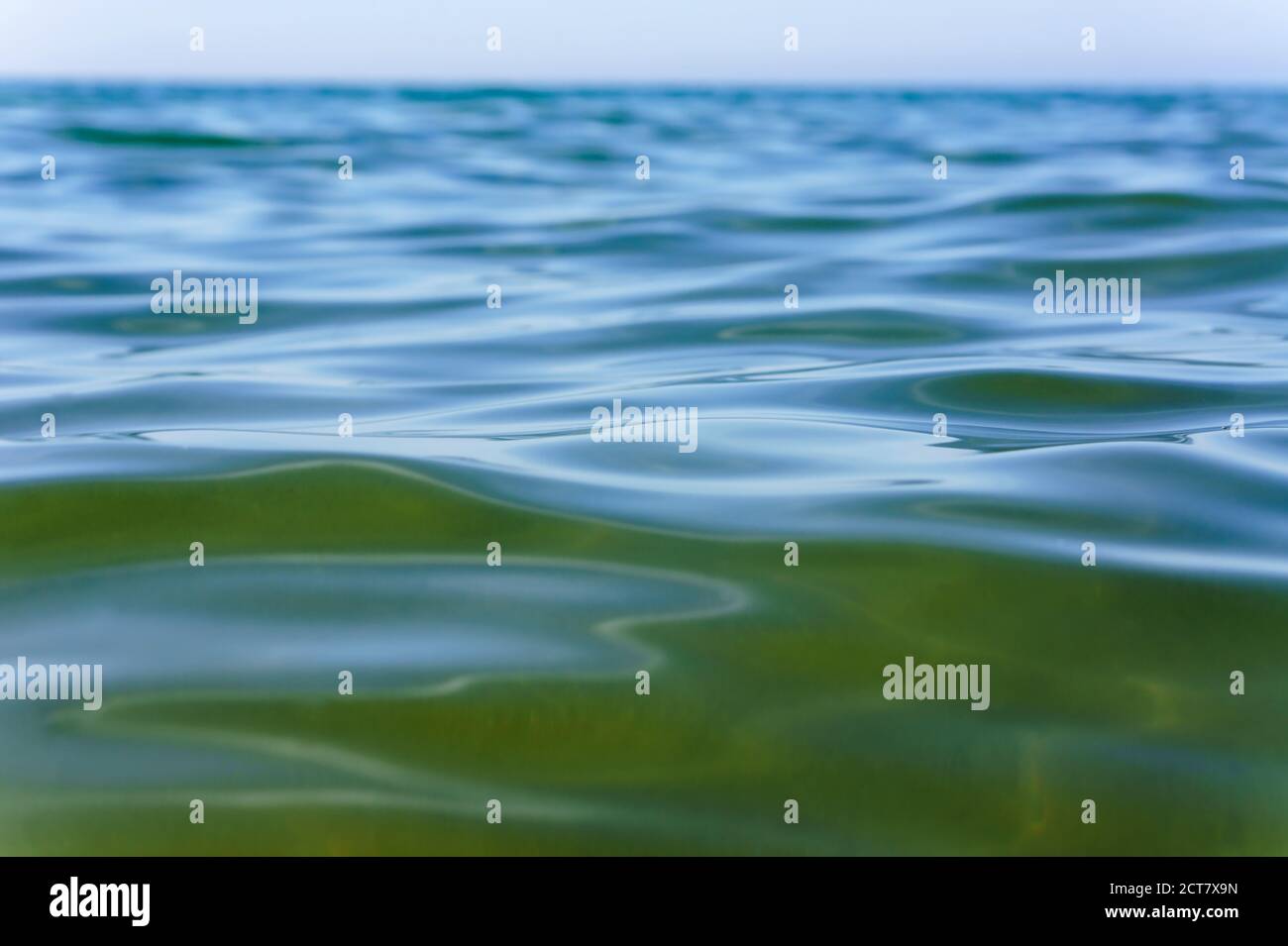 clear water surface, smooth green water Stock Photo - Alamy