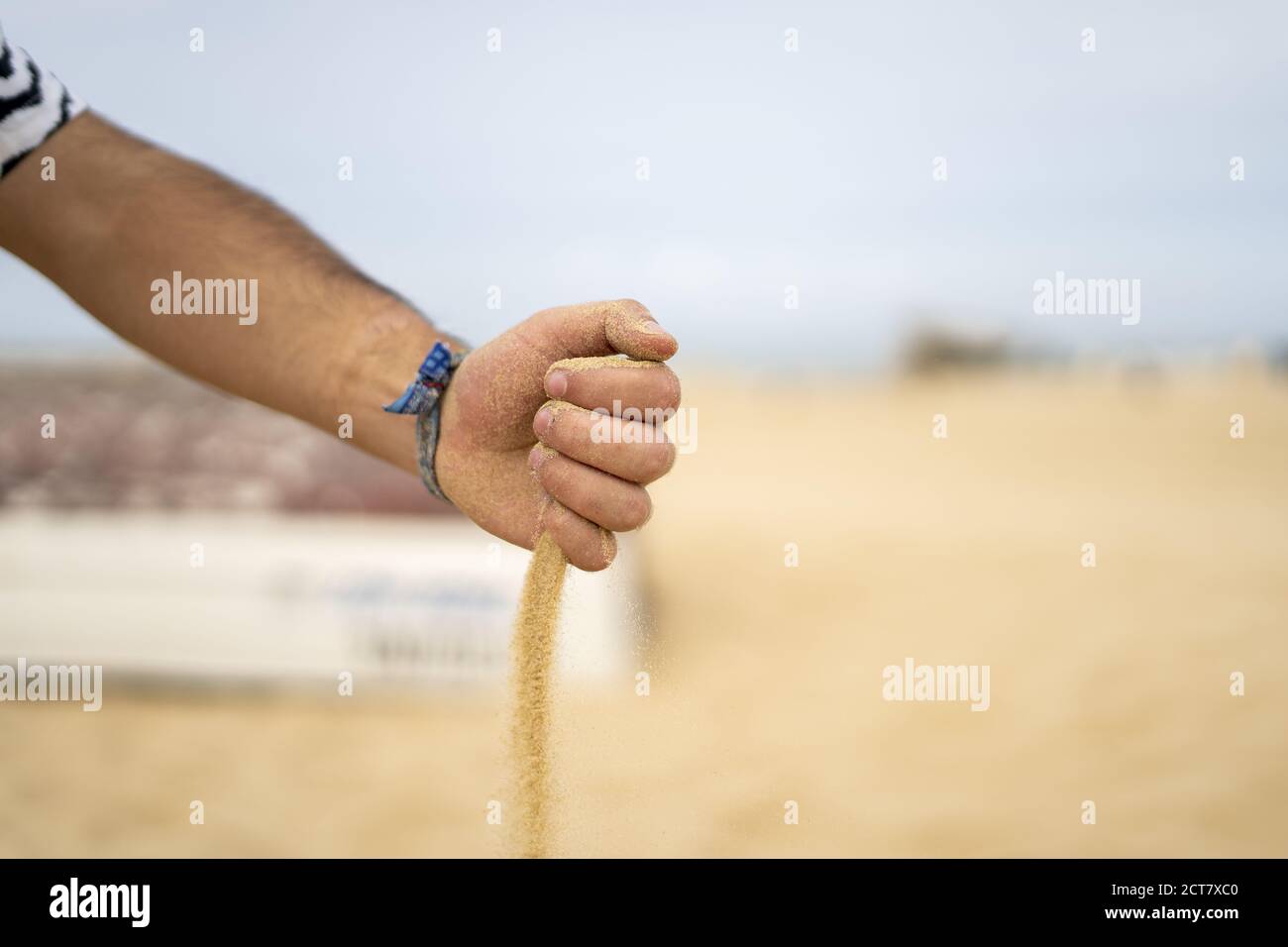Sand falling through hand hi-res stock photography and images - Alamy