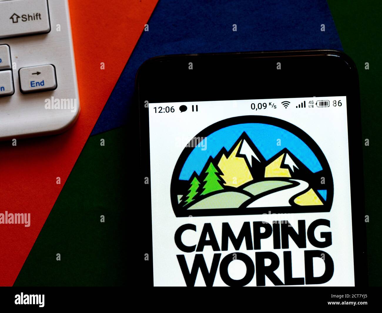In this photo illustration a Camping World logo seen displayed on a ...