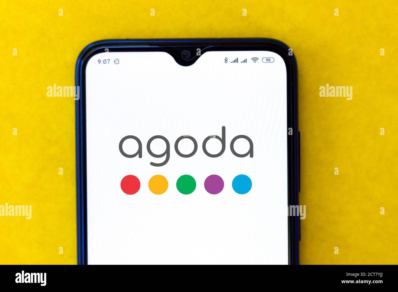 In this photo illustration of the Agoda.com logo seen displayed on a ...