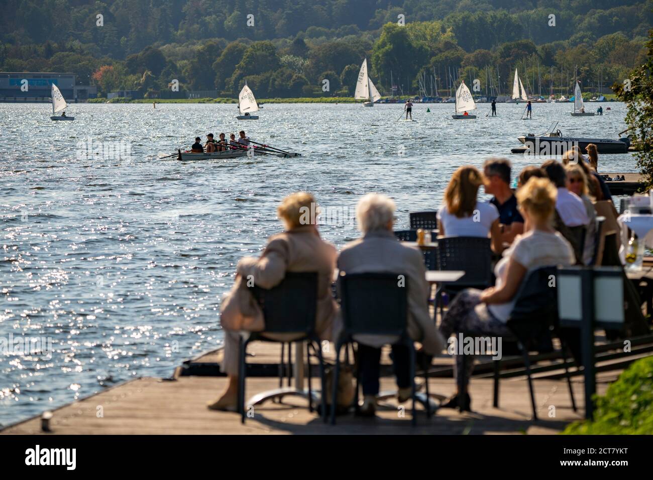 Lake Baldeney in Essen, Ruhr reservoir, sailing boats, Café terrace at ...