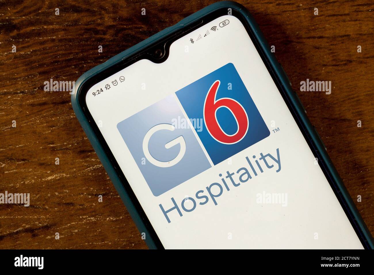 In this photo illustration the G6 Hospitality logo seen displayed on a ...