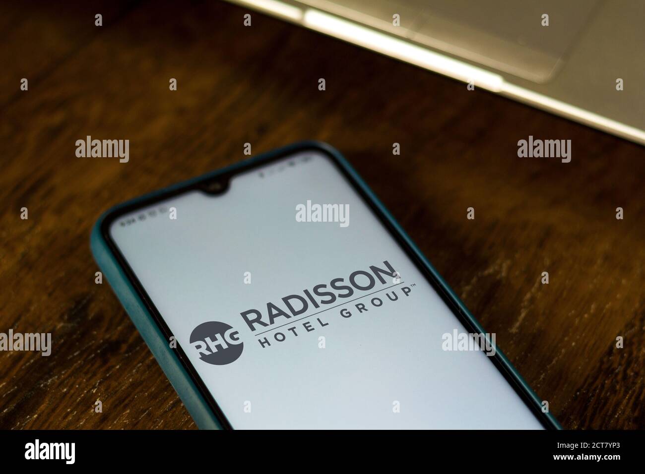 In this photo illustration the Radisson Hotel Group logo seen displayed ...