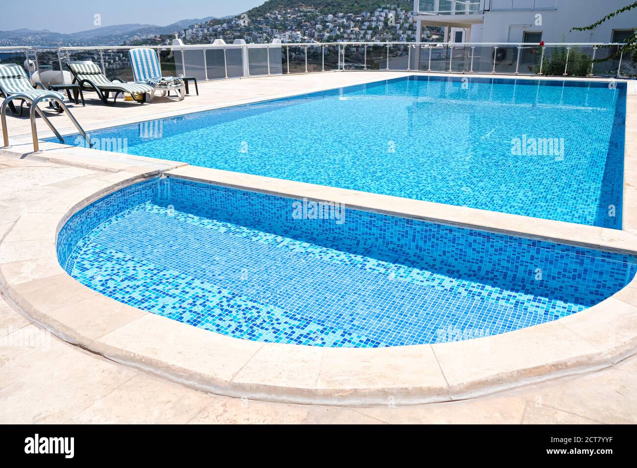 BODRUM, TURKEY -July 2020. Swimming pool with turquoise color water at ...