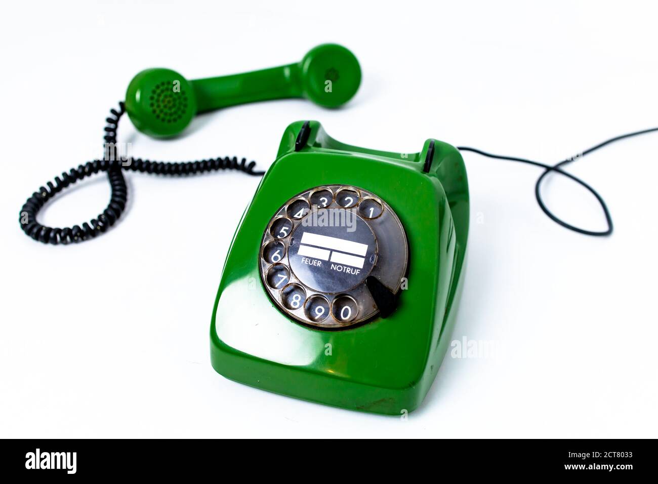 Old retro green phone, isolated on white background Stock Photo - Alamy